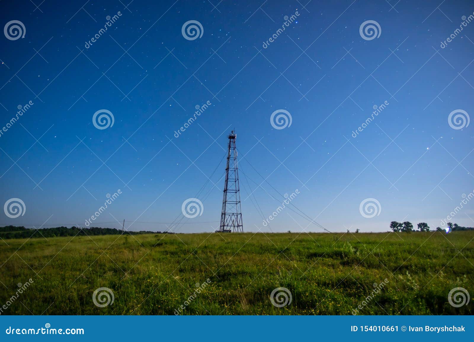 Telecommunication Tower Against the Starry Sky in the Field Stock Image ...
