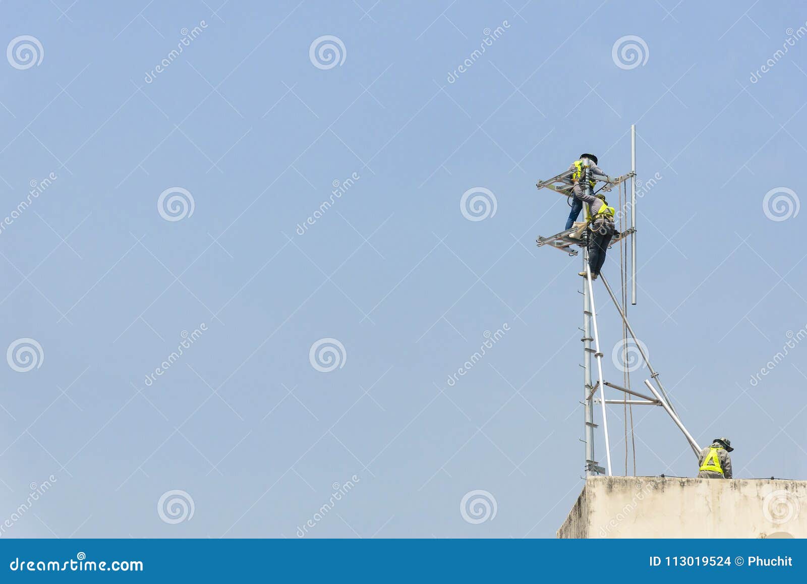 The Telecommunication Tower with the Worker Stock Photo - Image of ...