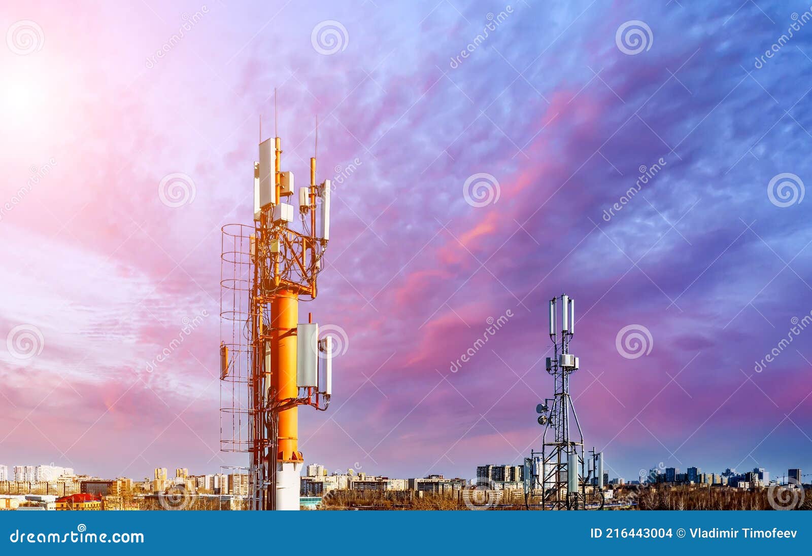 Telecommunication Towers with Blue Sky and White Clouds Background and ...