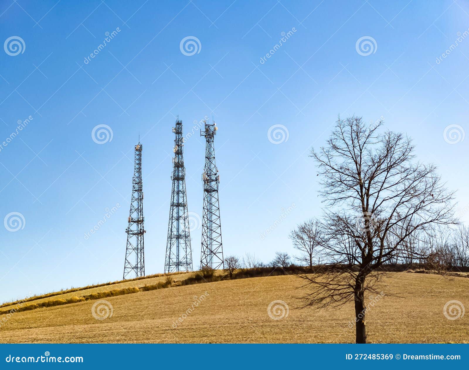 Telecommunication Towers on Field. Wireless Communication Antenna ...