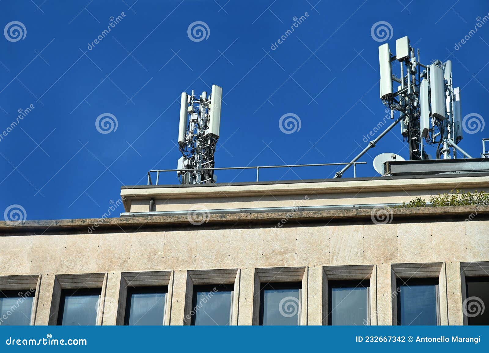 Telecommunications Antennas on Building Roof Stock Photo - Image of ...