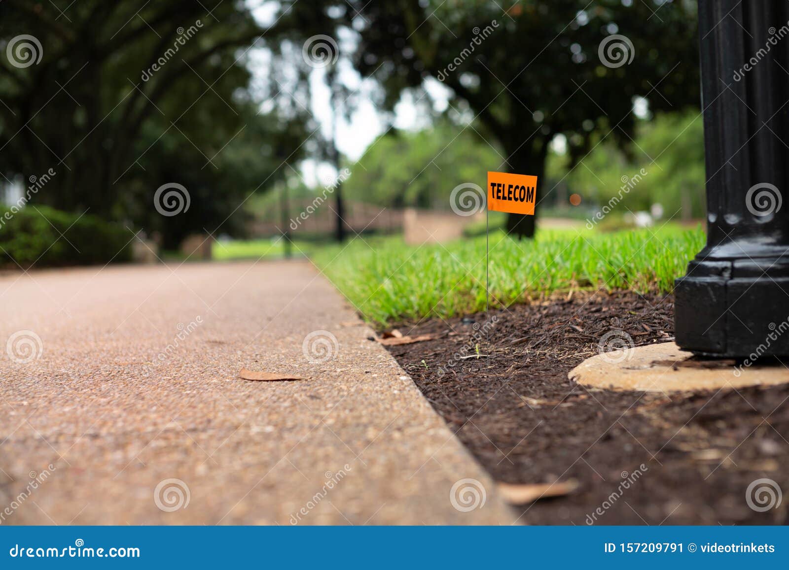Telecommunications, Cable Line Stake Flag beside a Light Post Stock ...