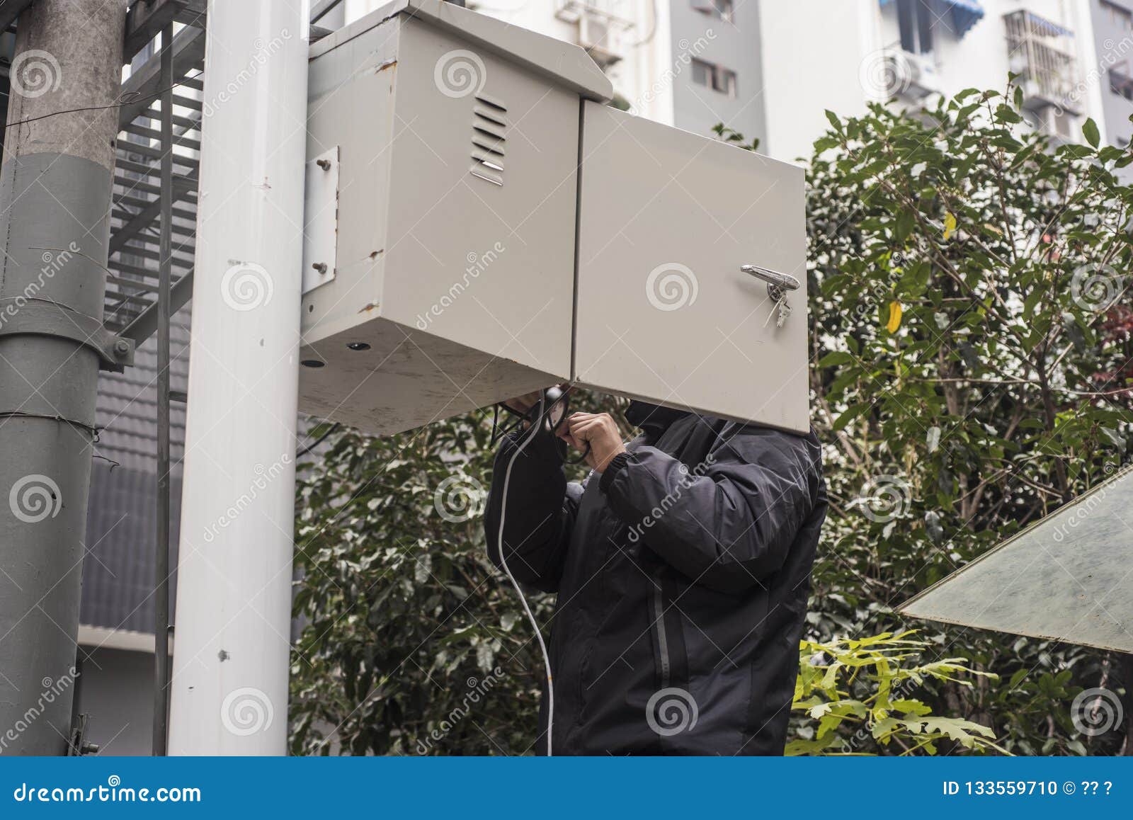 A Telecommunications Maintenance Worker is Checking Equipment Stock ...