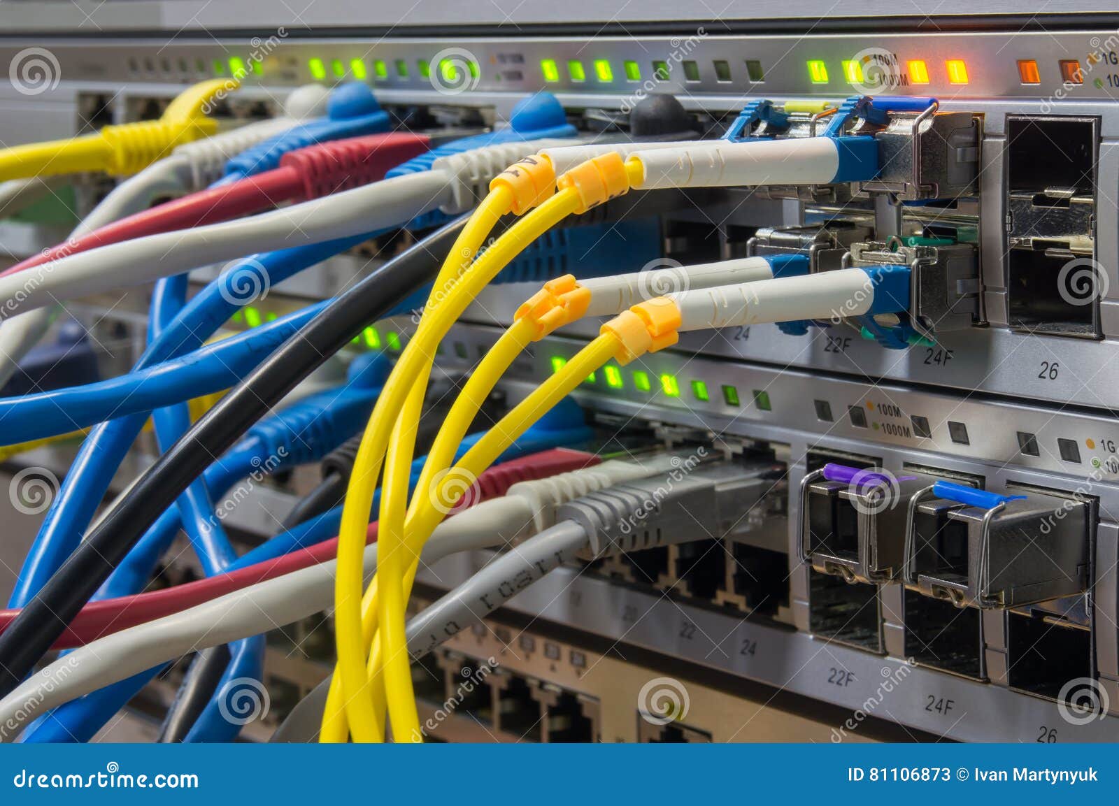 Telecommunications Rack with Switches and Colored UTP and Fiber Stock ...