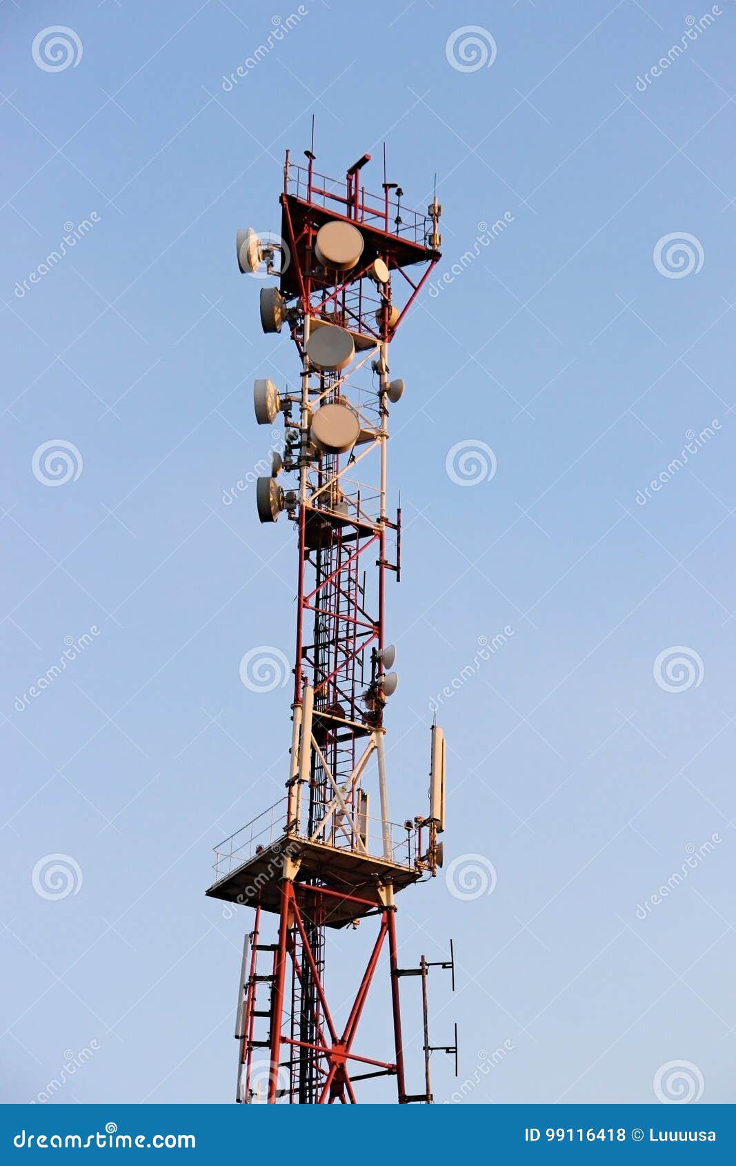Telecommunications Tower and Satellite Dish Telecom Network on Blue Sky ...