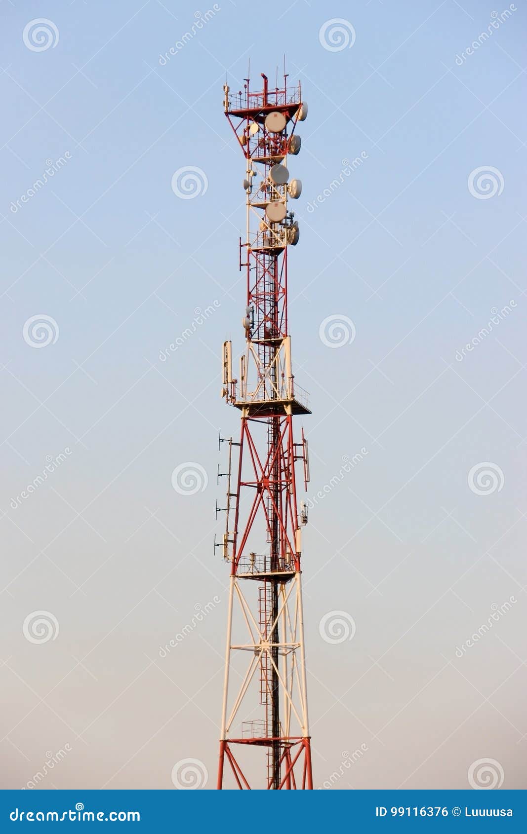 Telecommunications Tower and Satellite Dish Telecom Network on Blue Sky ...