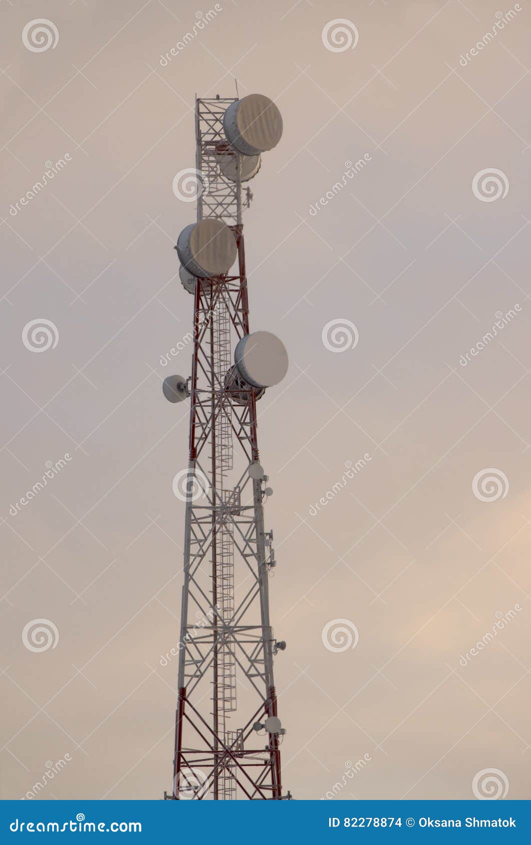 Telecommunications Tower and Satellite Dish Telecom Network on Evening ...