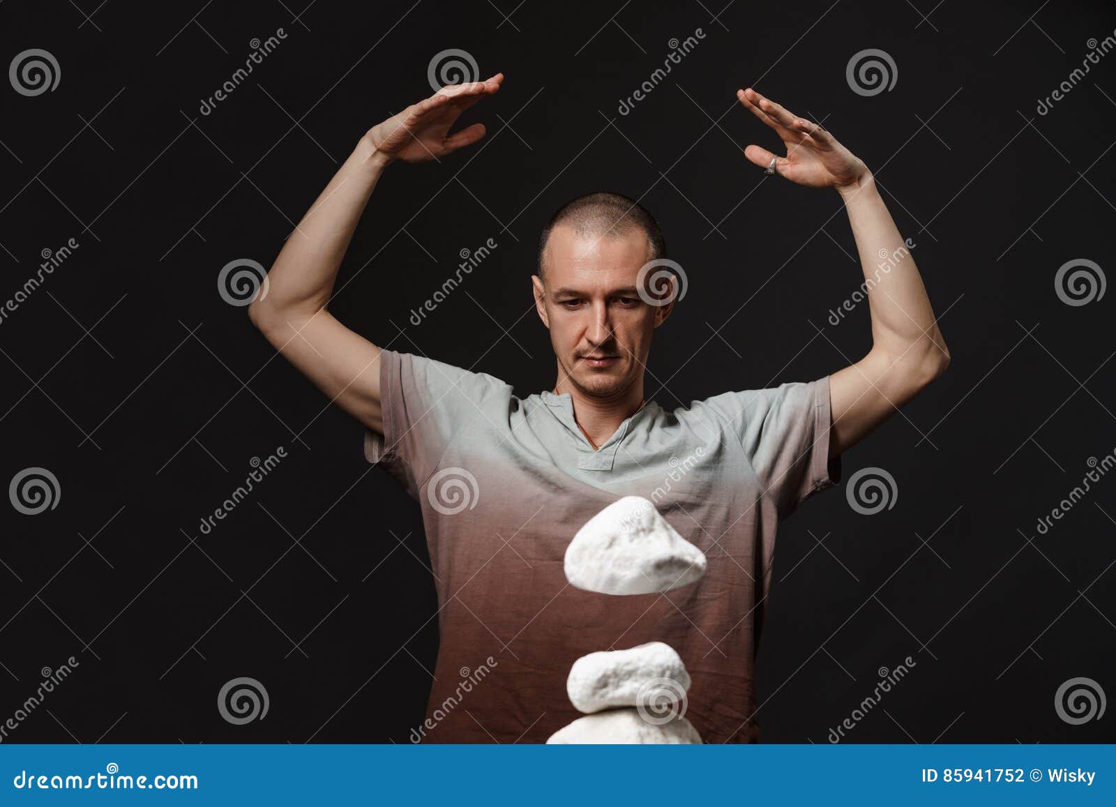 Telekinesis - Man Making Stones Levitating Stock Photo - Image of ...