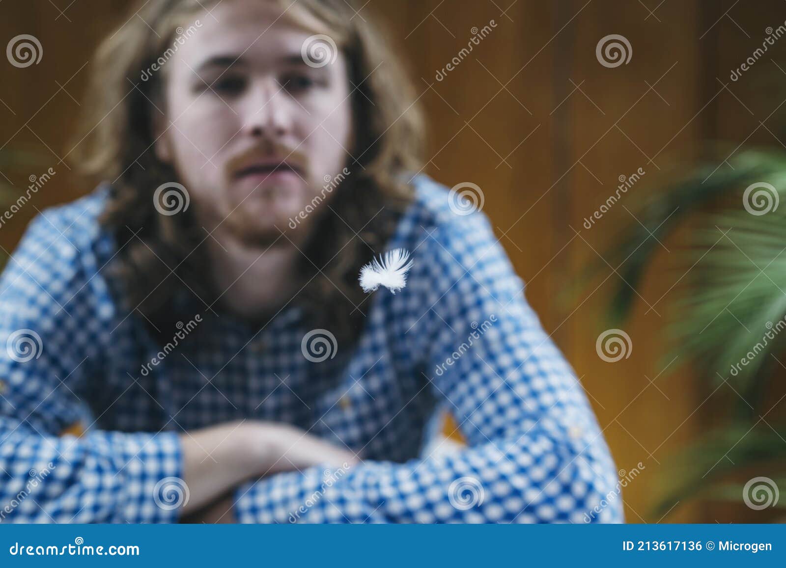 Telekinetic Power - Practicing Telekinesis with Feather Stock Photo ...