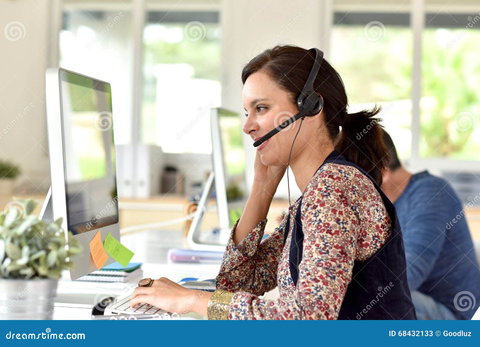 Teleoperator in Front of Desktop Stock Image - Image of people, phone ...
