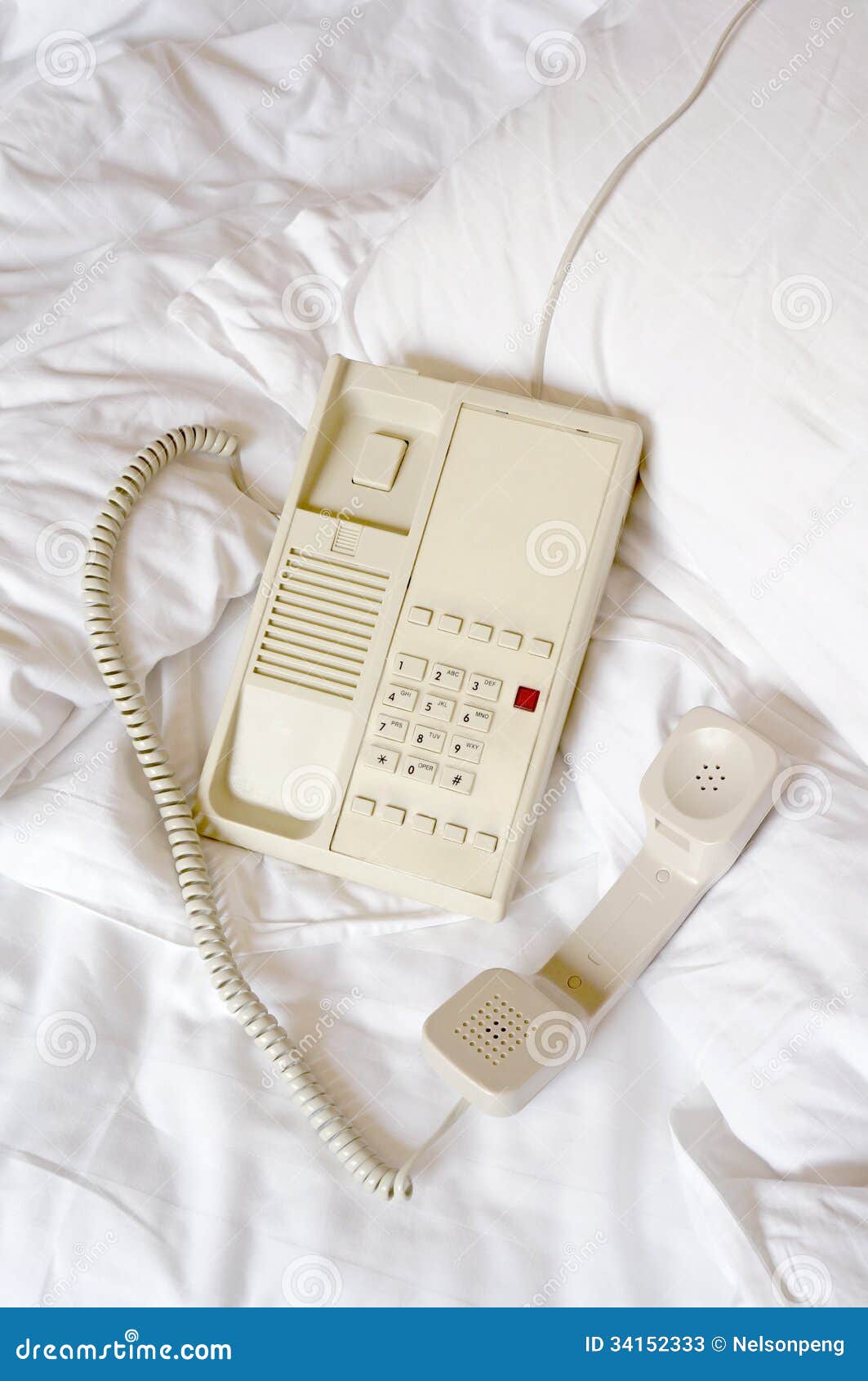 Telephone on bed sheet stock image. Image of phone, line - 34152333