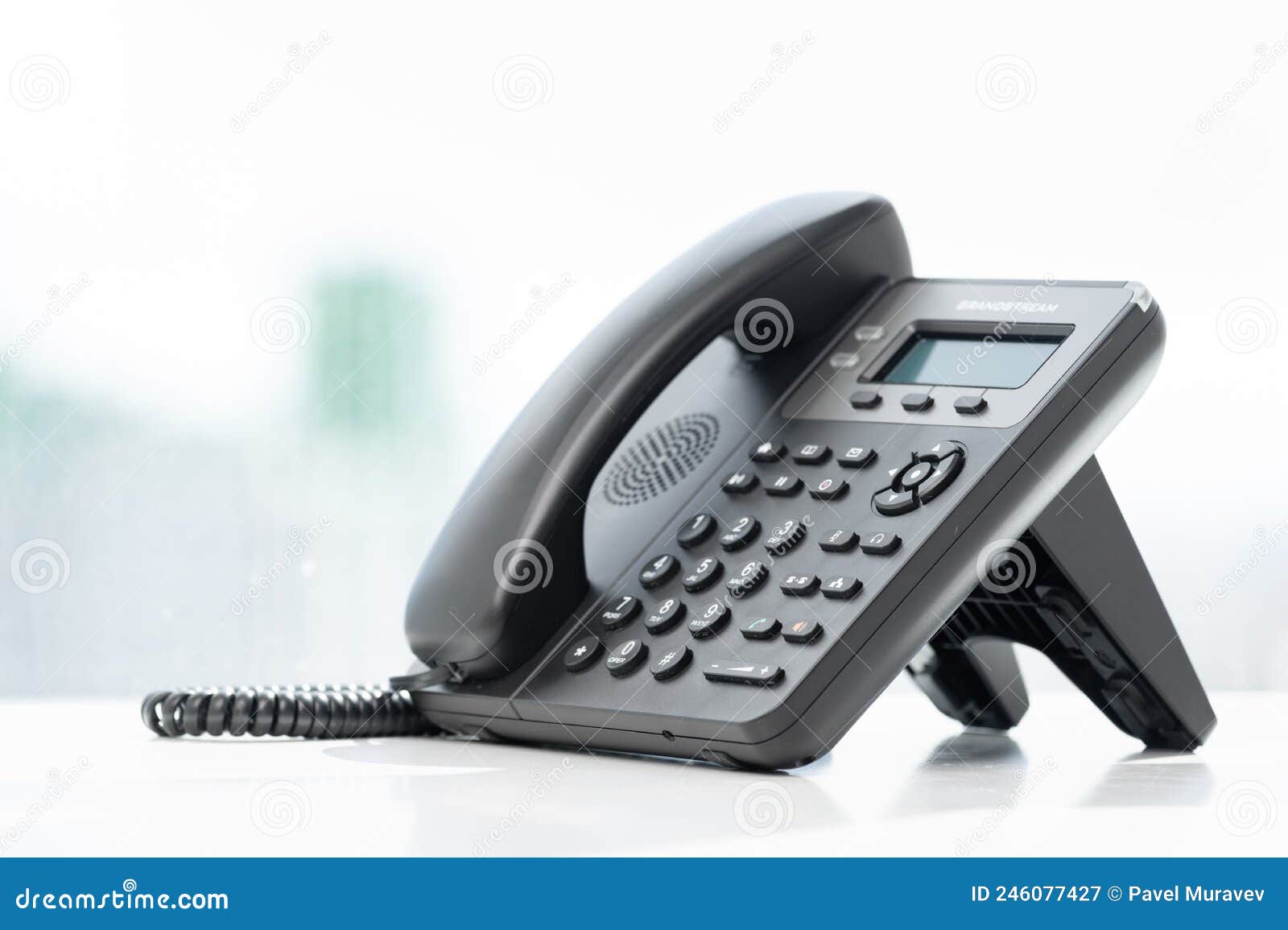 Telephone Devices at White Office Desk with Light Effect, Communication ...