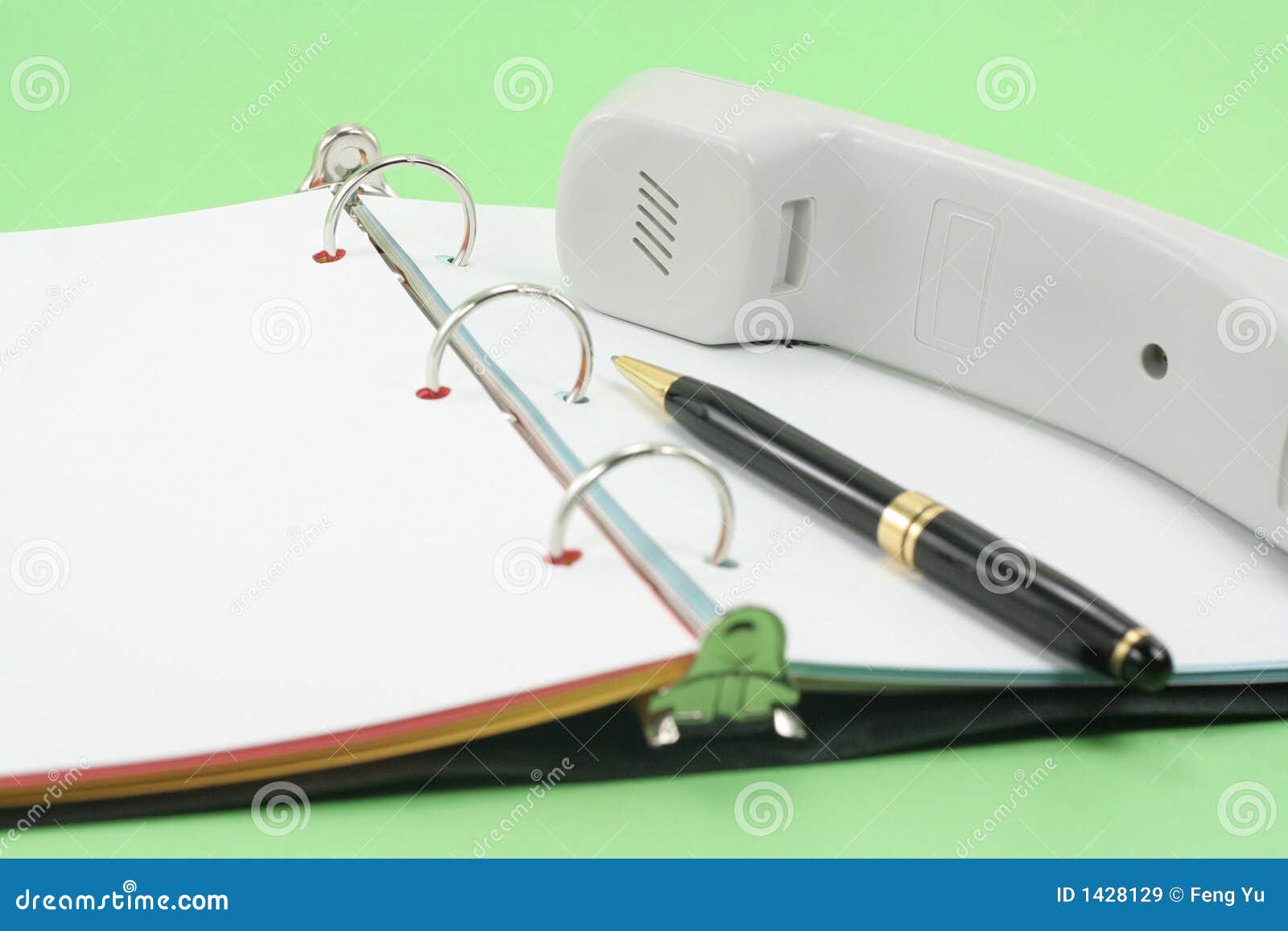 Telephone and notebook stock image. Image of marketing - 1428129