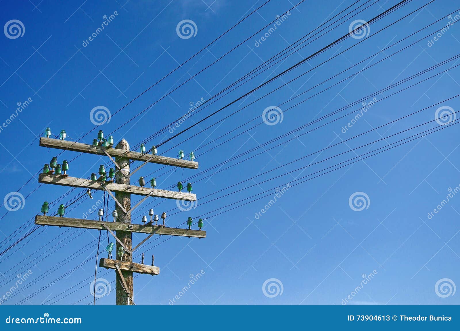 Wooden telephone pole stock image. Image of blue, line - 73904613