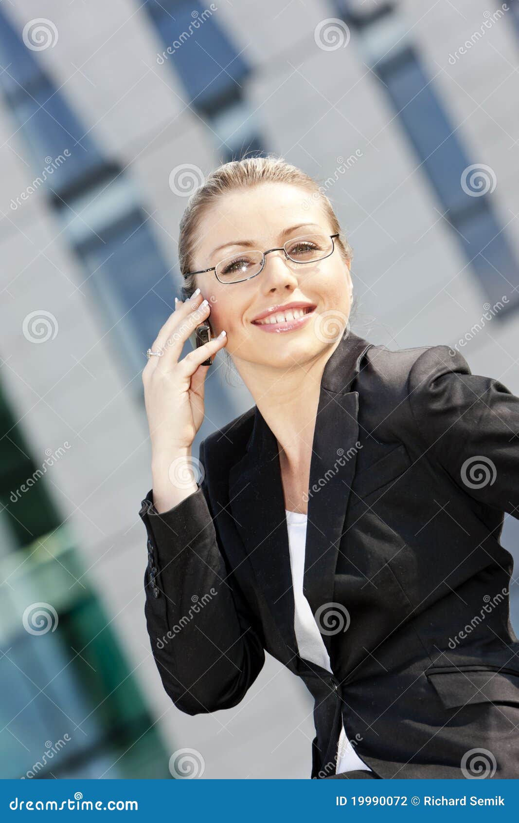 Telephoning businesswoman stock photo. Image of person - 19990072