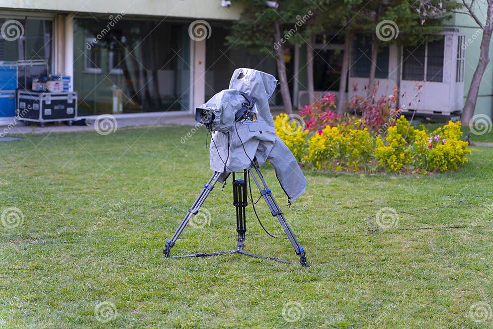 Television Broadcast Camera Setup on a Tripod and Protected Stock Image ...
