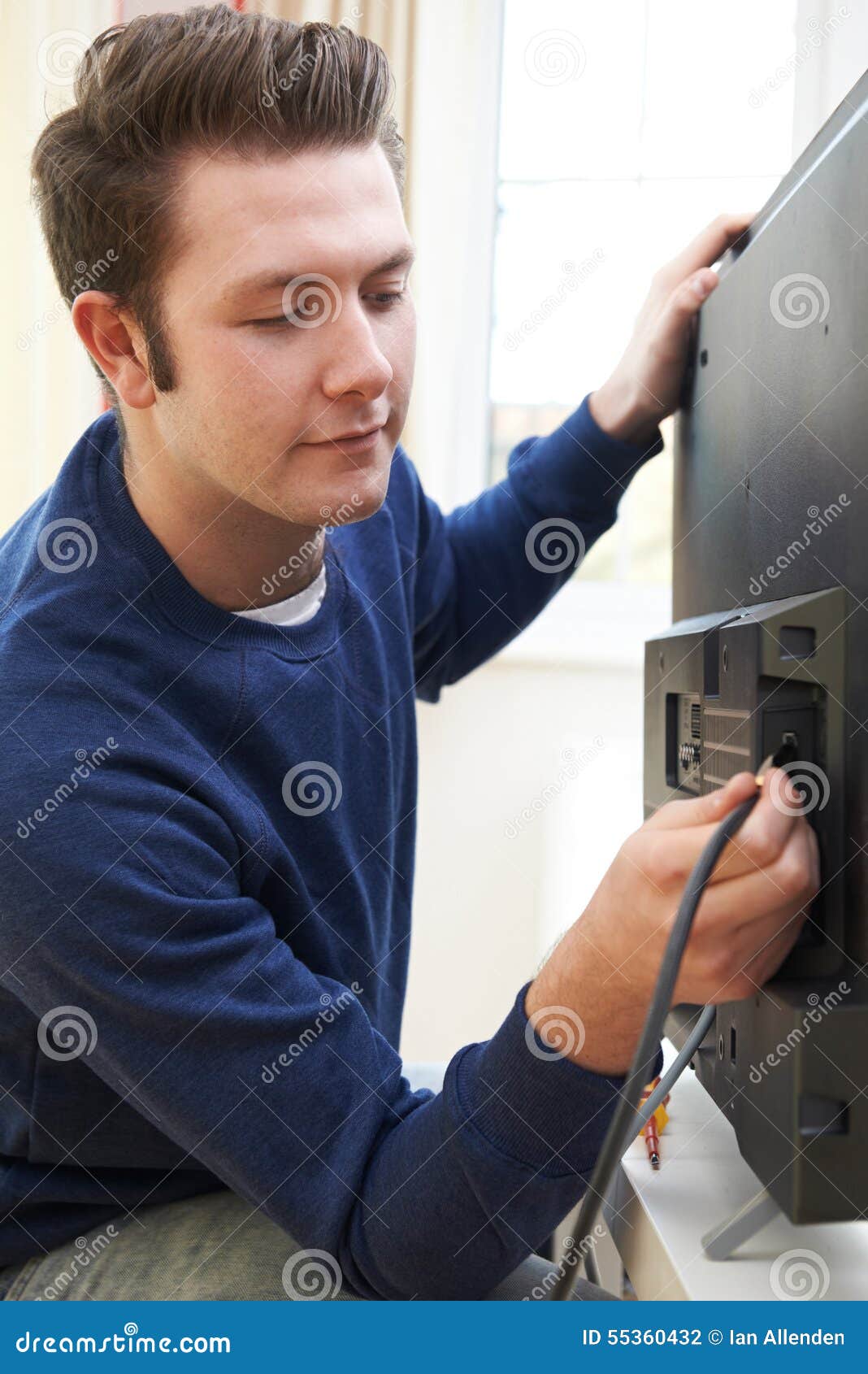 Television Engineer Installing New Television at Home Stock Photo ...