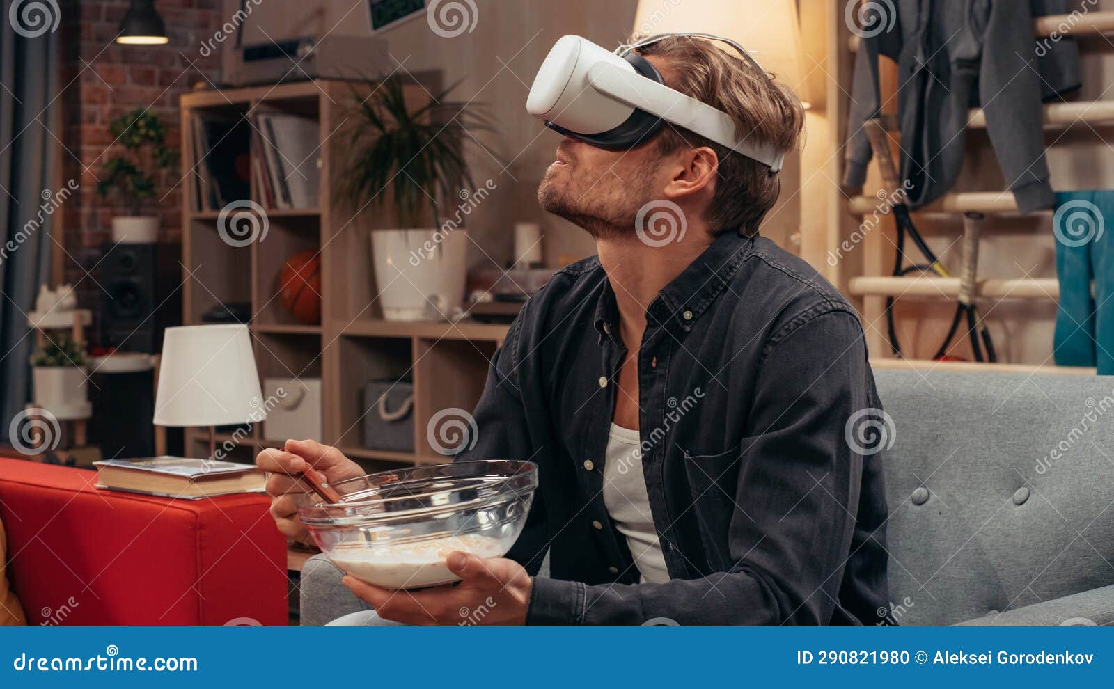Television Sitcom Concept: Guy Using Virtual Reality Headset Eating ...