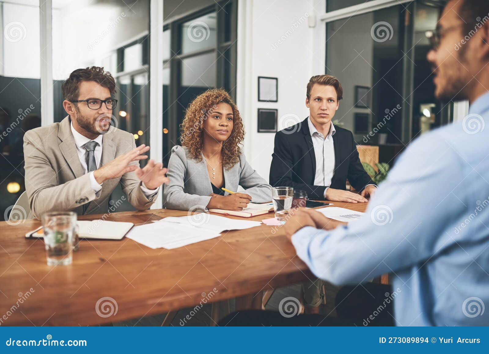 Tell Us Why we Should Hire You. a Group of Businesspeople Interviewing ... Tell Us Why we Should Hire You. a Group of Businesspeople Interviewing ...