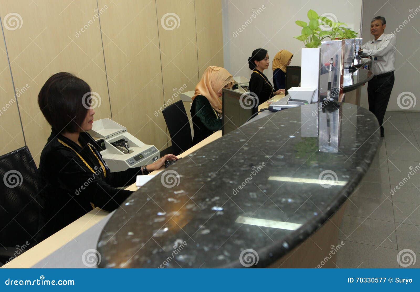 Teller editorial photography. Image of teller, serving - 70330577