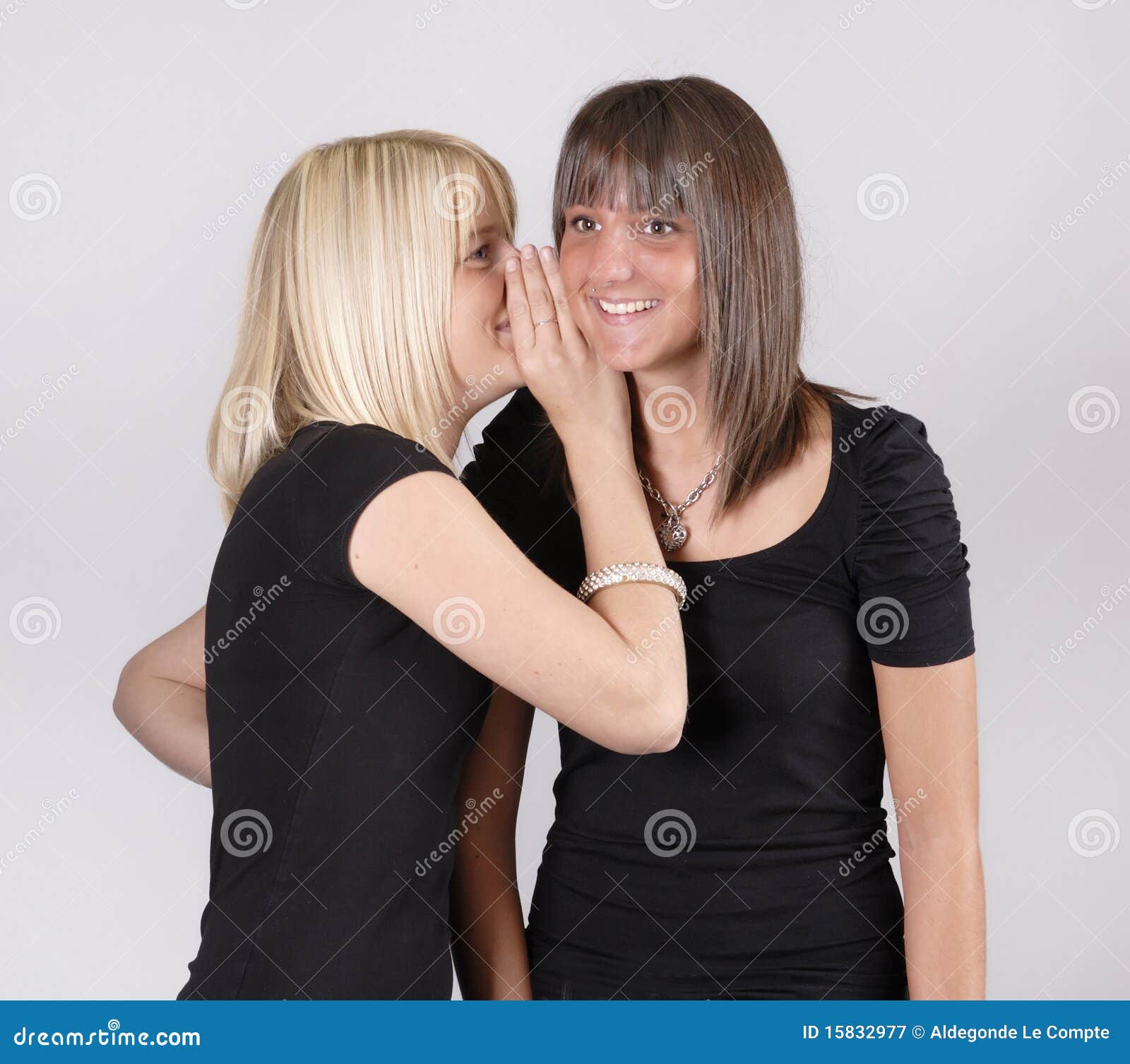 Telling secrets stock image. Image of square, brown, blond - 15832977