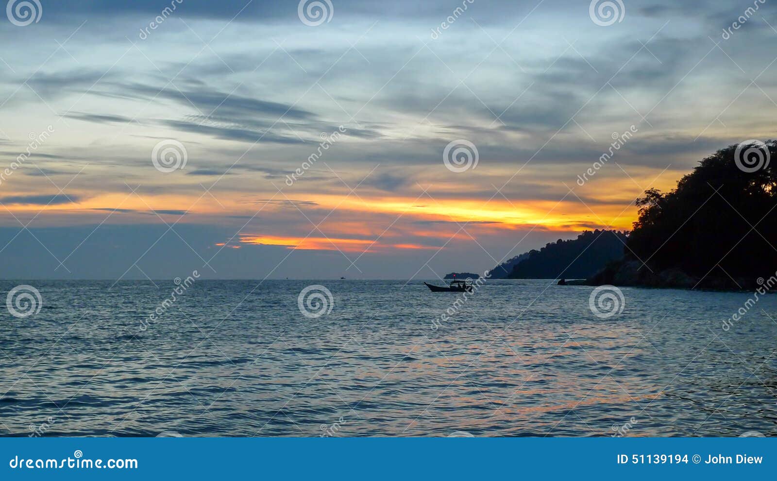 Teluk Batik Sunset stock photo. Image of sunset, orange - 51139194