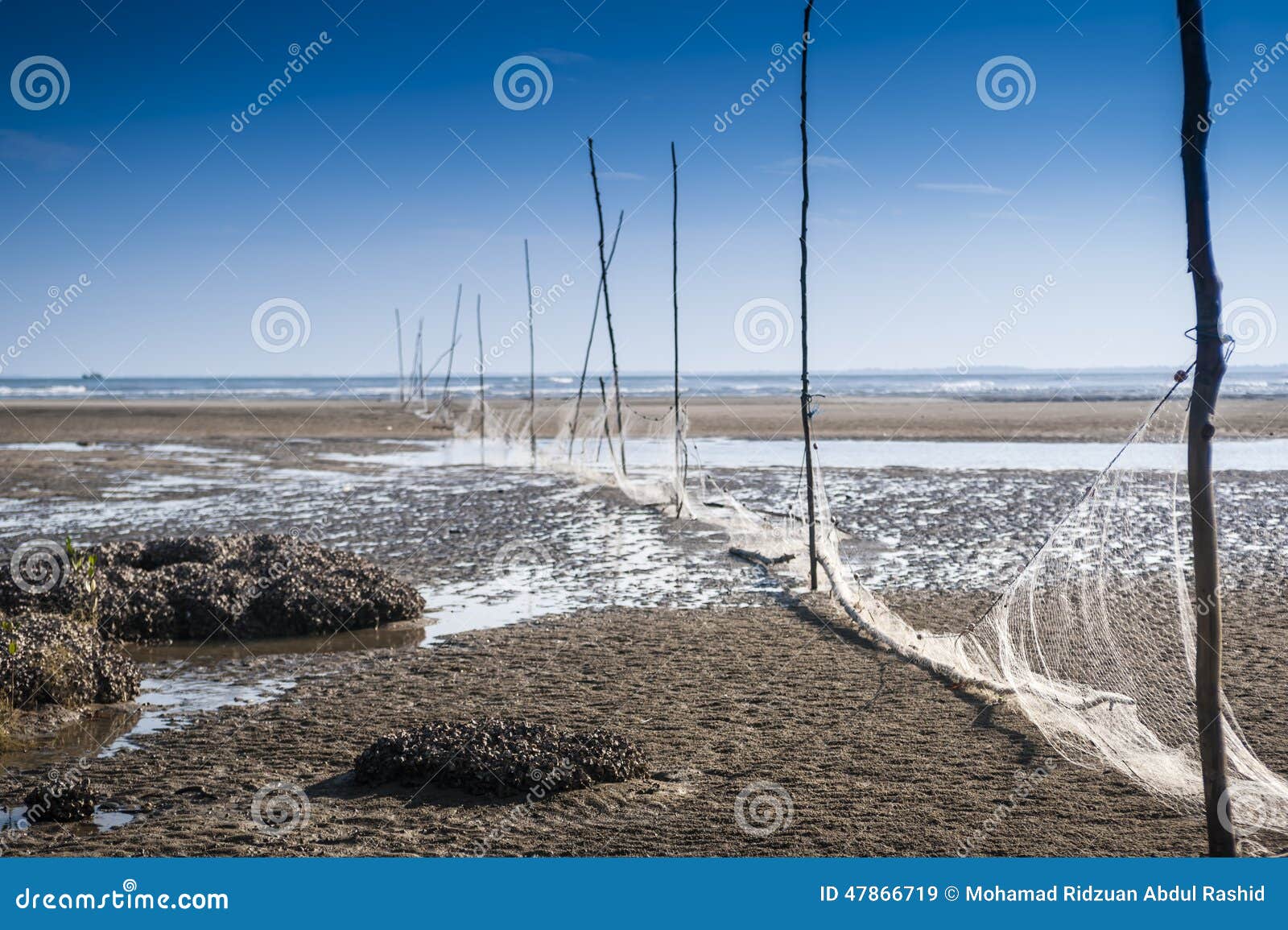 Teluk Sisek Beach stock image. Image of nature, clouds - 47866719