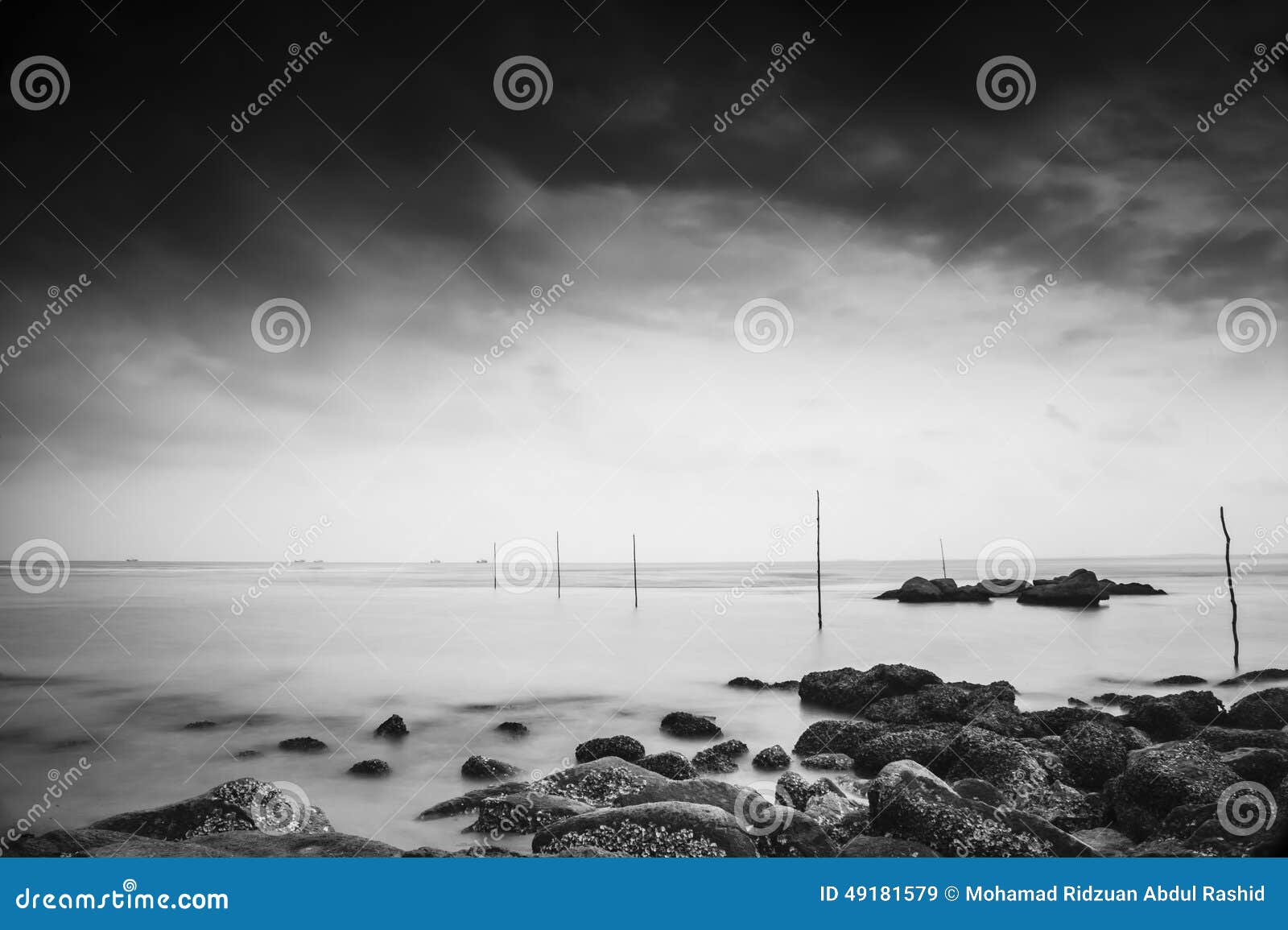 Teluk Sisek Beach stock image. Image of smoky, stone - 49181579