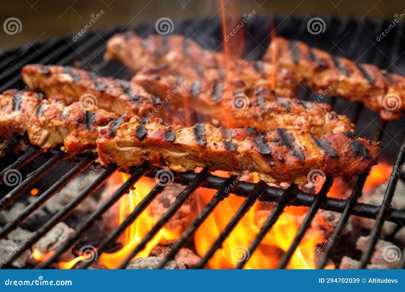 Tempeh Ribs on Bbq with Flames Licking the Edges Stock Image - Image of ...