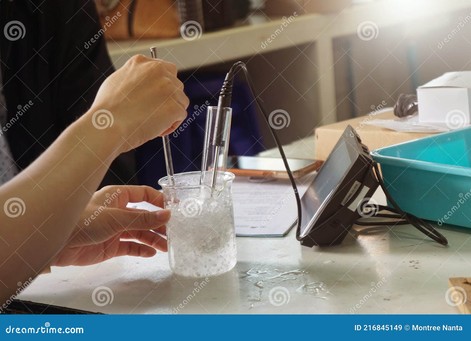 The Temperature Probe is Measuring the Ice Temperature in Beaker ...