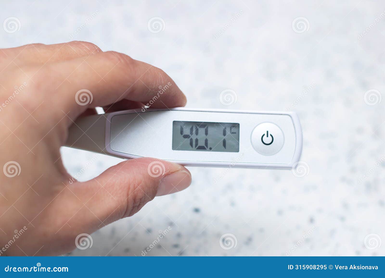 Temperature of 40.1 Shown on Digital Thermometer Held by Hand Stock ...