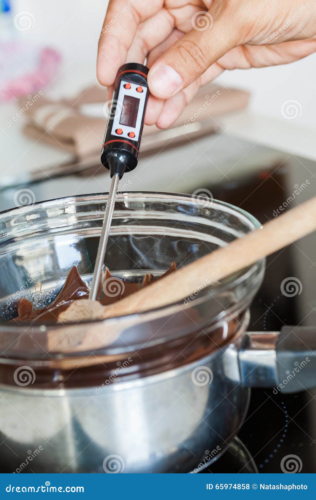 Tempering Chocolate stock photo. Image of melting, people - 65974858