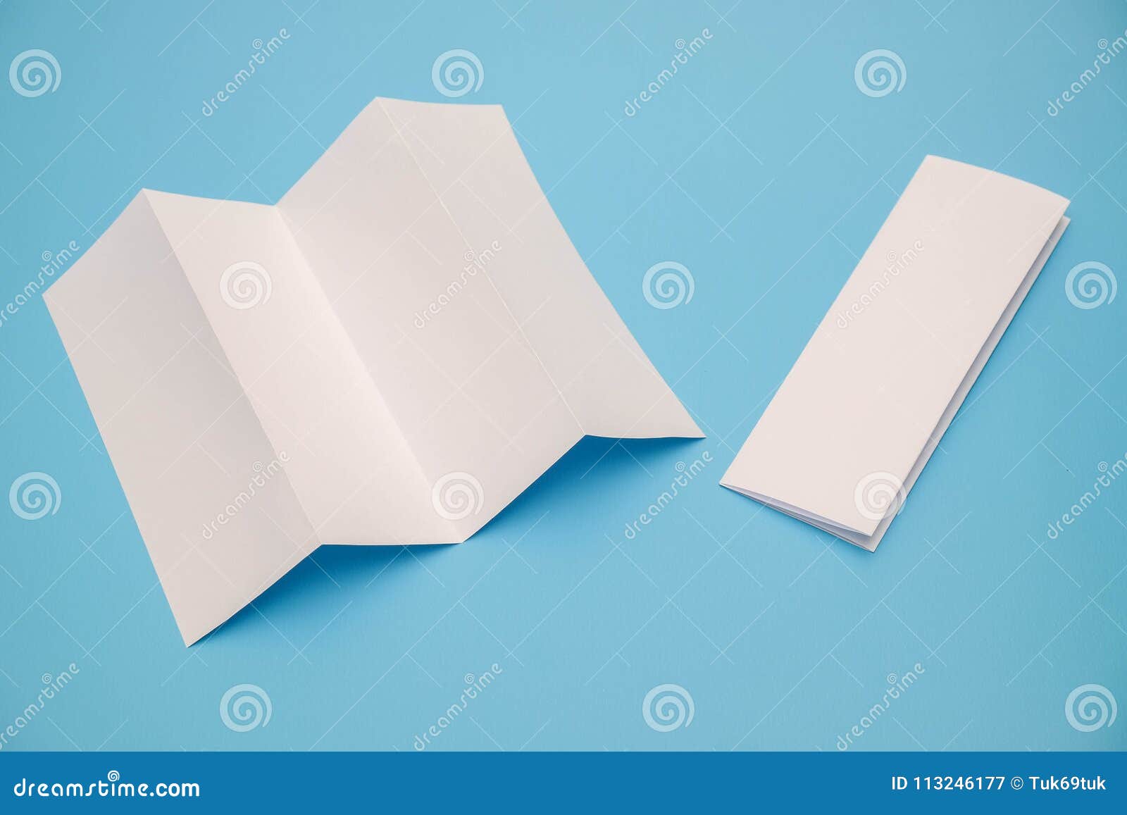 Template Fold White Paper on Blue Background Stock Image - Image of ...