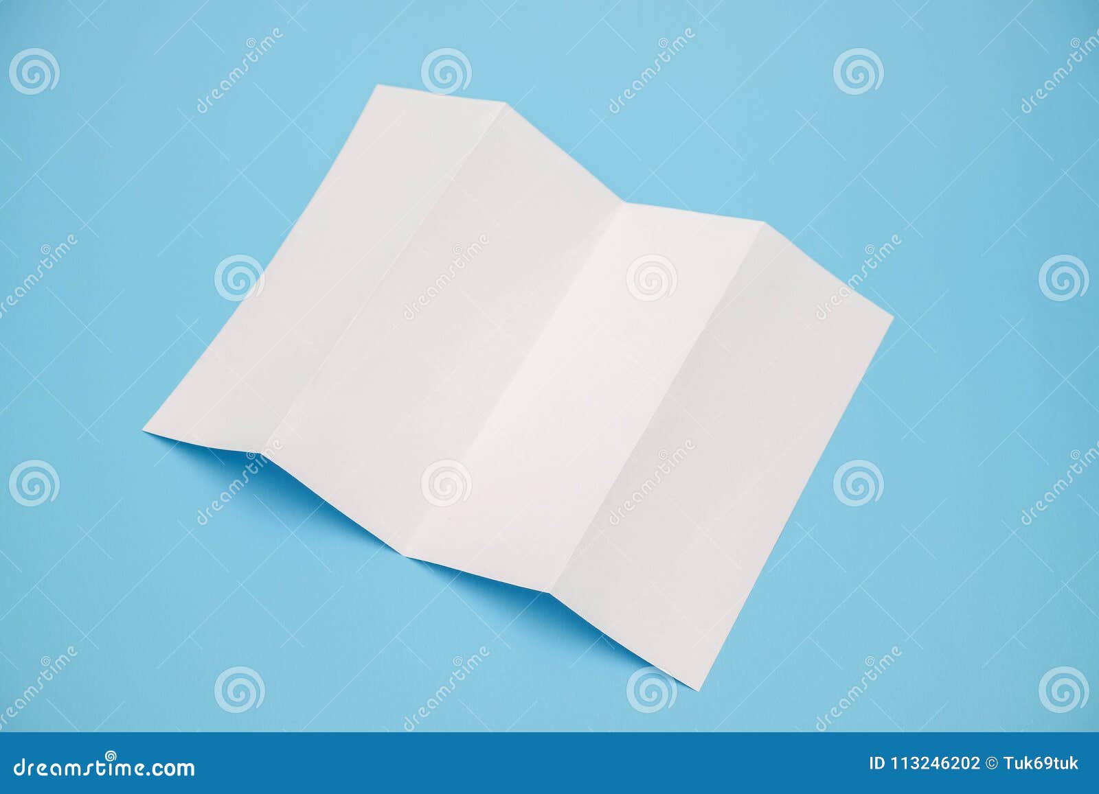 Template Fold White Paper on Blue Background Stock Photo - Image of ...