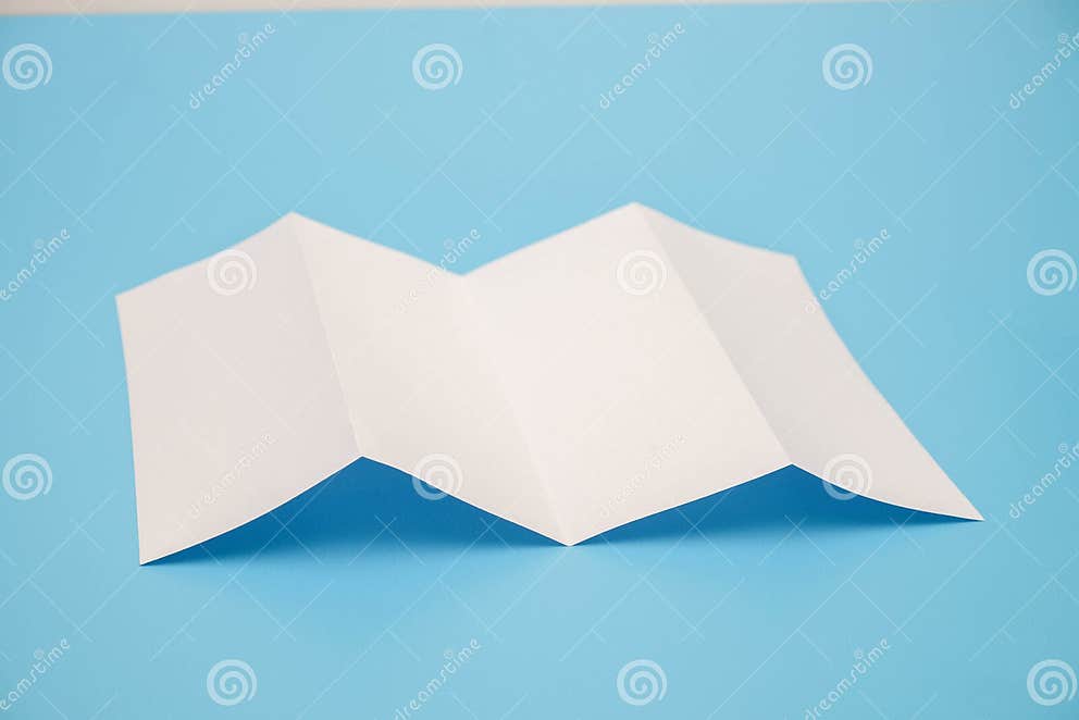 Template Fold White Paper on Blue Background Stock Image - Image of ...