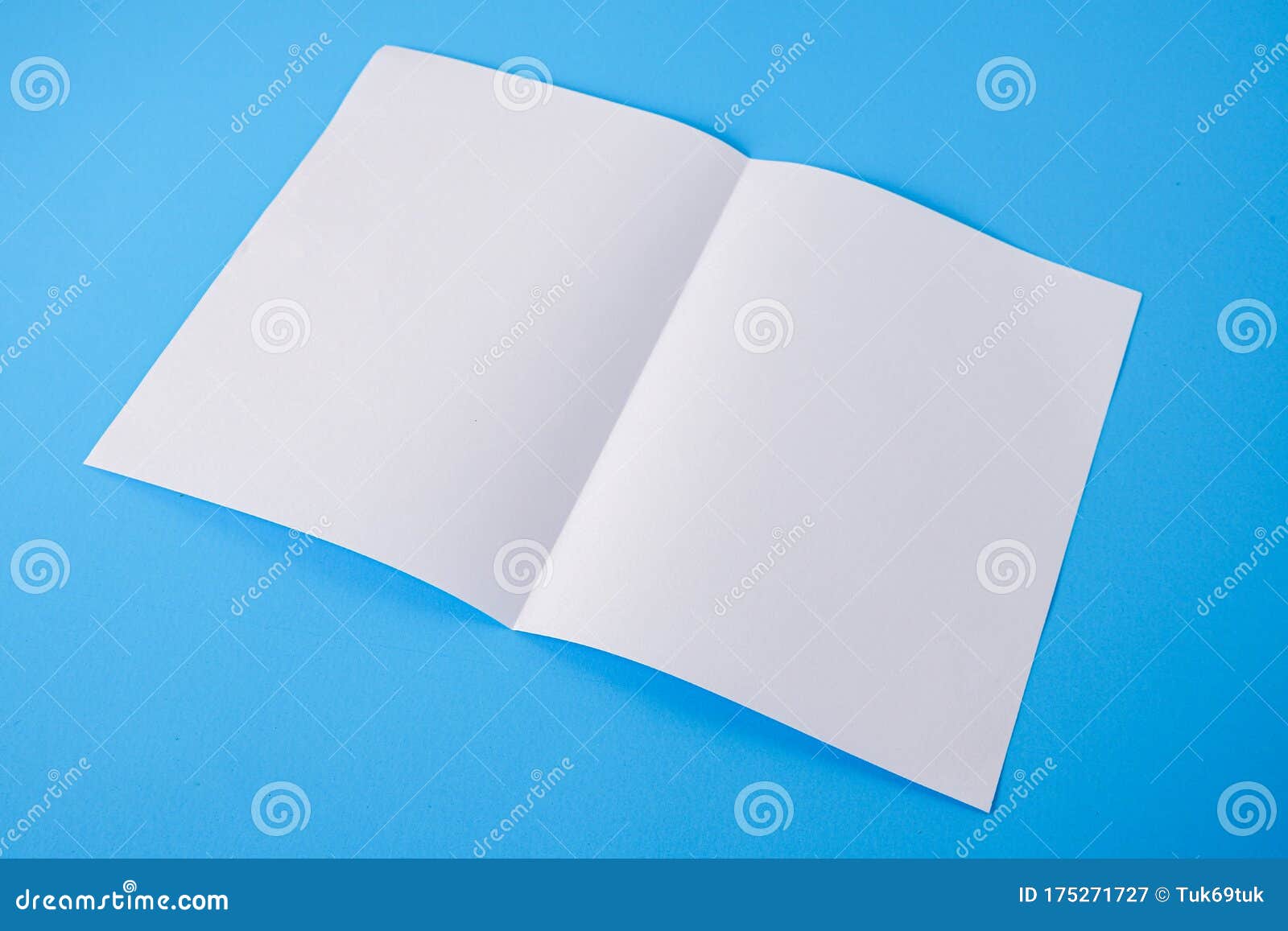 Template Fold White Paper on Blue Background Stock Image - Image of ...