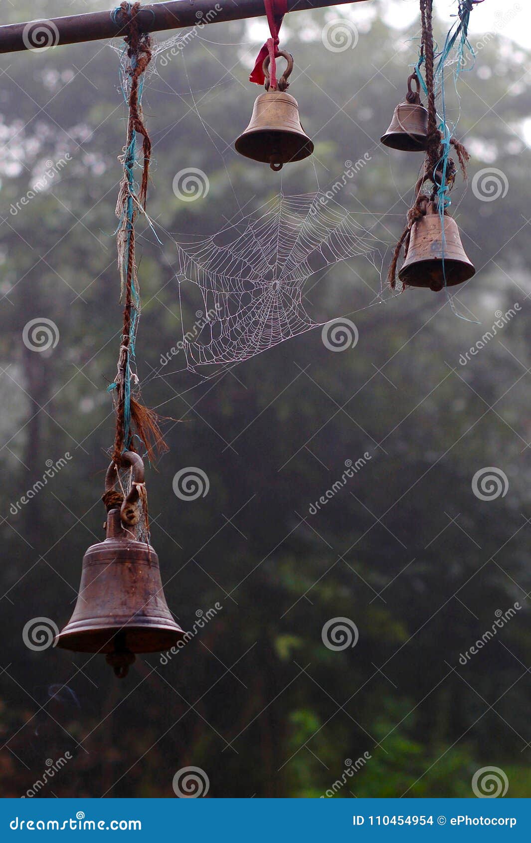 Temple Bells and Spider Web Stock Photo - Image of entrance, door ...