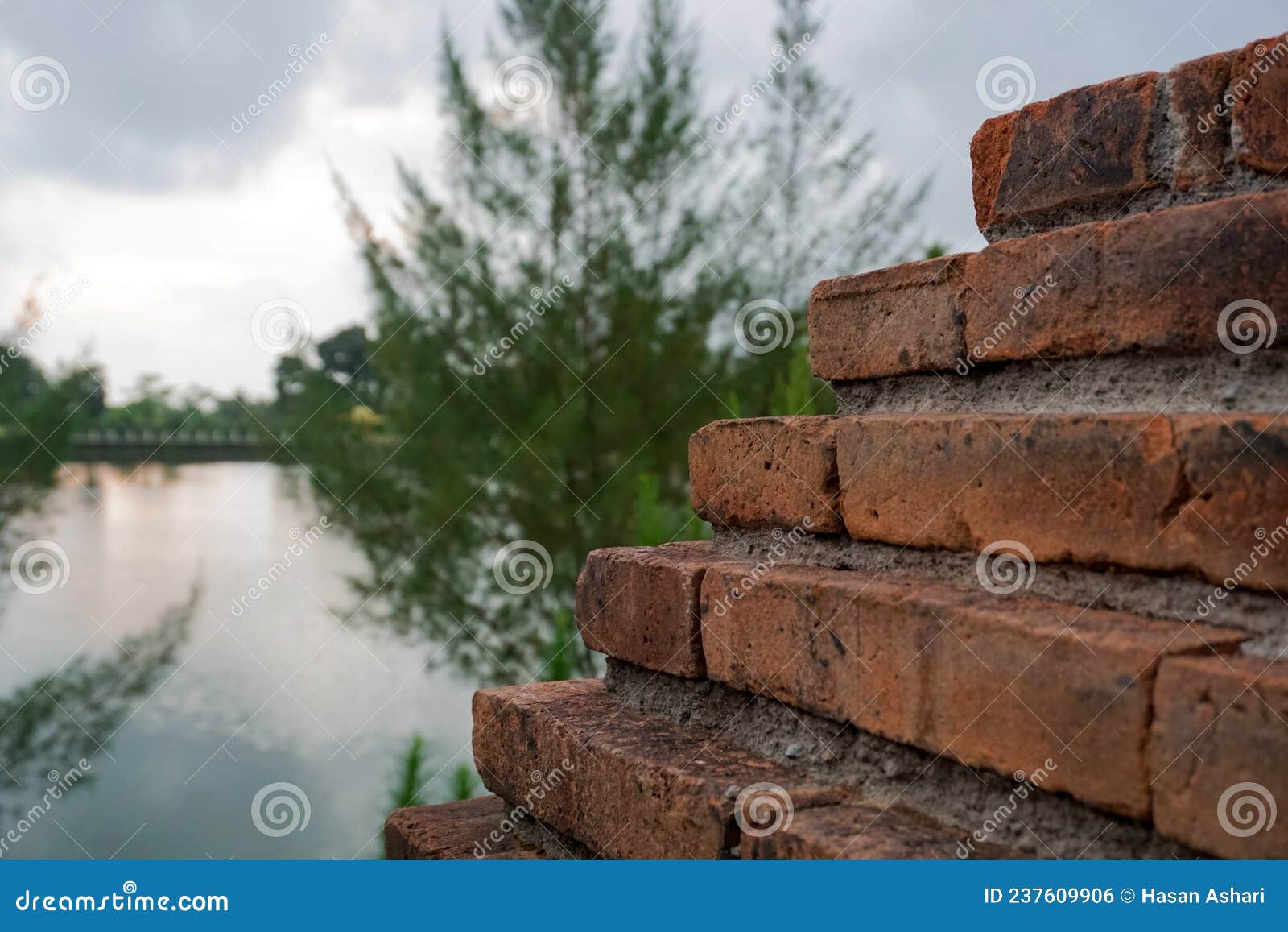 Temple Building Made of Red Bricks with a Pond Background Stock Photo ...