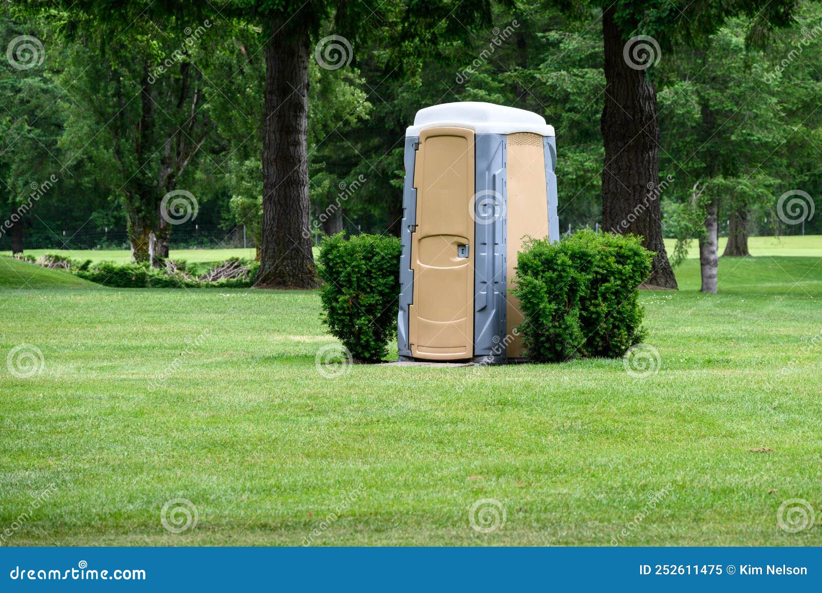 Temporary Plastic Outhouse in a Park Like Setting Stock Image - Image ...