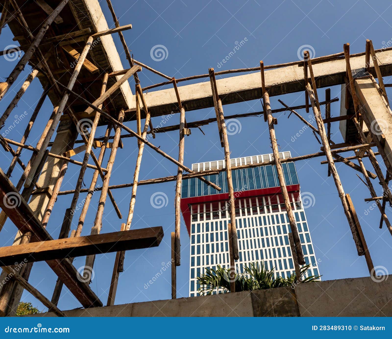 Temporary Wooden Pole for Supports the Concrete Structure a Building ...