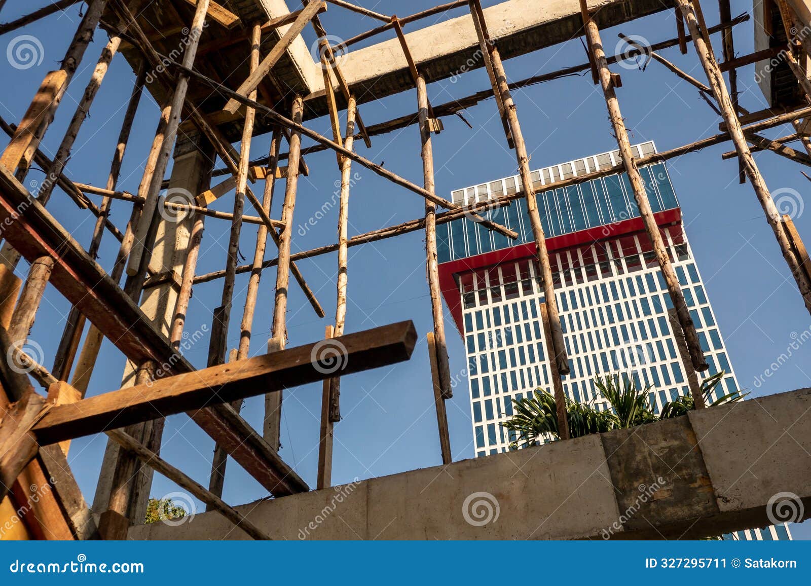 Temporary Wooden Pole for Supports the Concrete Structure a Building ...