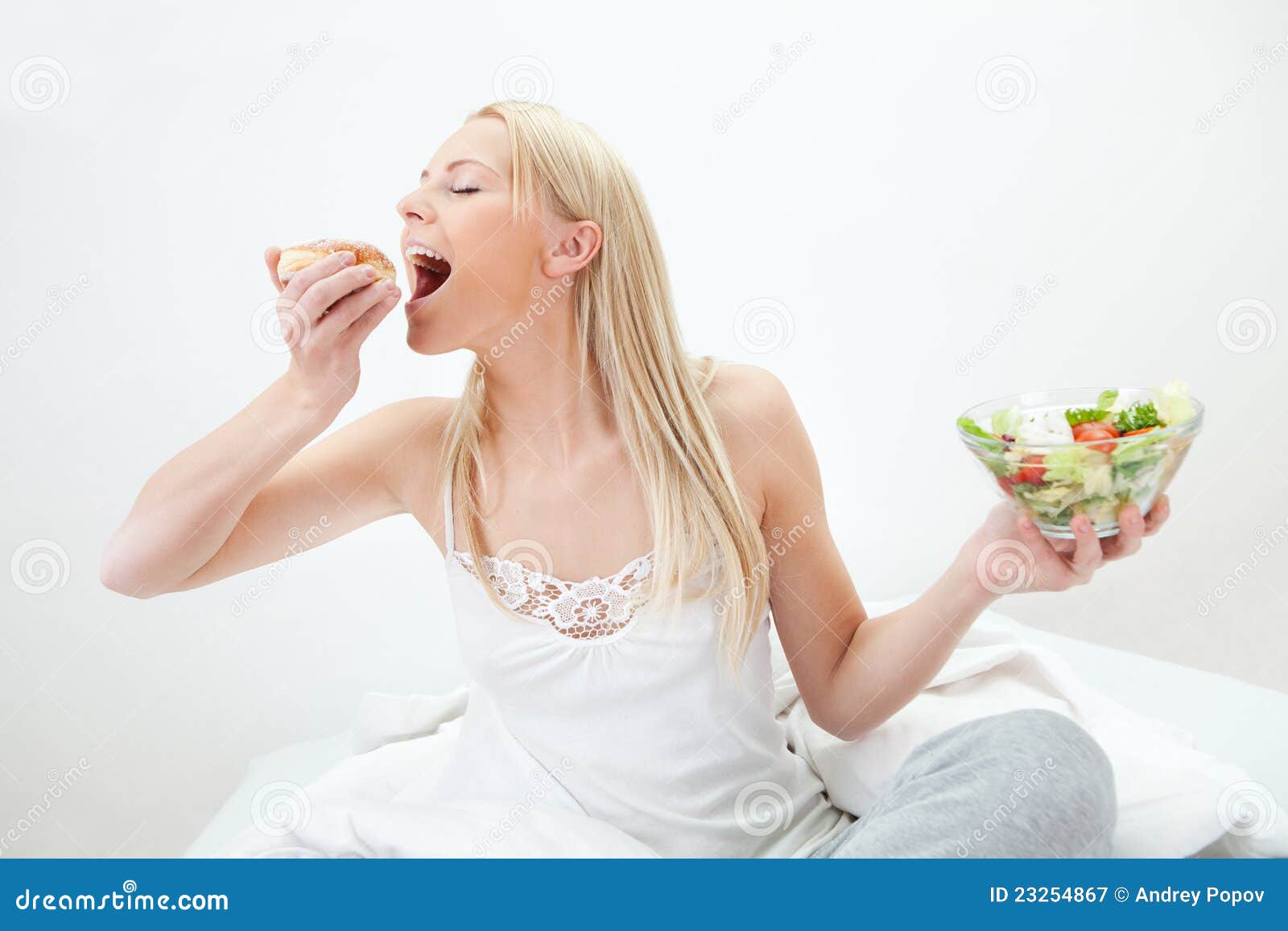 Tempted Young Woman Making a Food Choice Stock Image - Image of ...