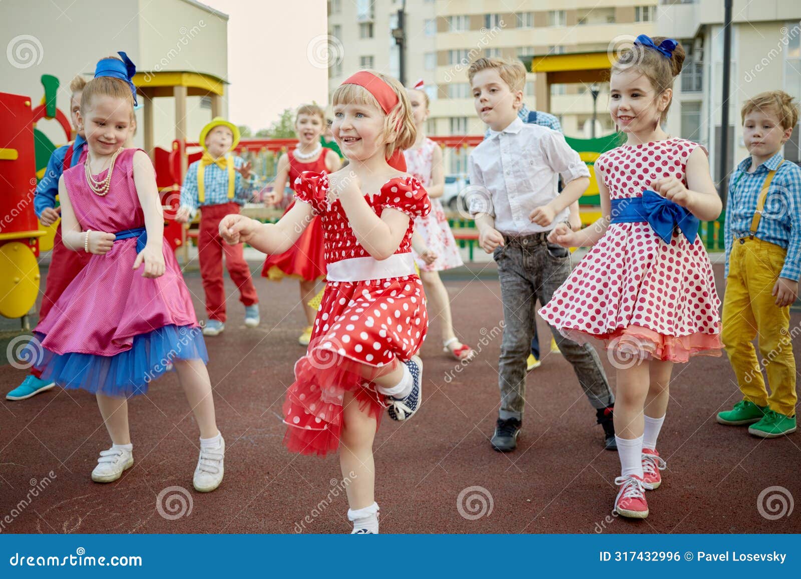 Ten Children Dance at Playground in Stock Photo - Image of costume ...