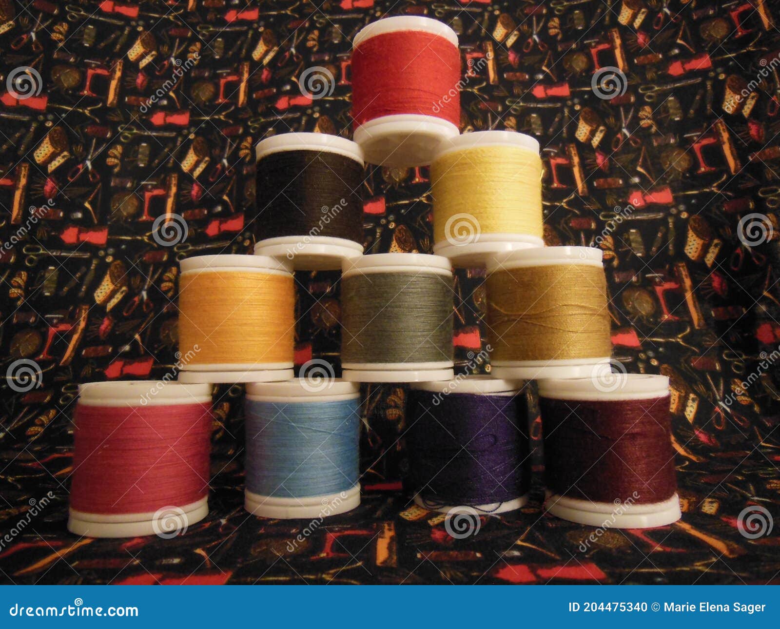 Colorful Thread Stacked stock photo. Image of blue, yellow - 204475340