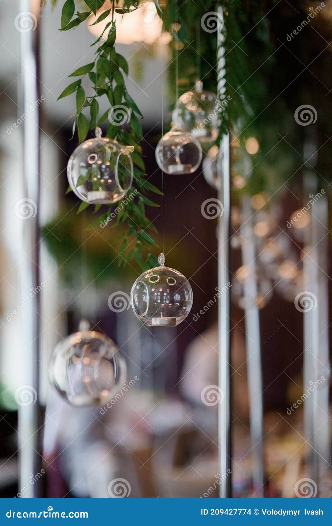 Tender Glass Candlestick is Hanging with Greenery in the Room Interior ...