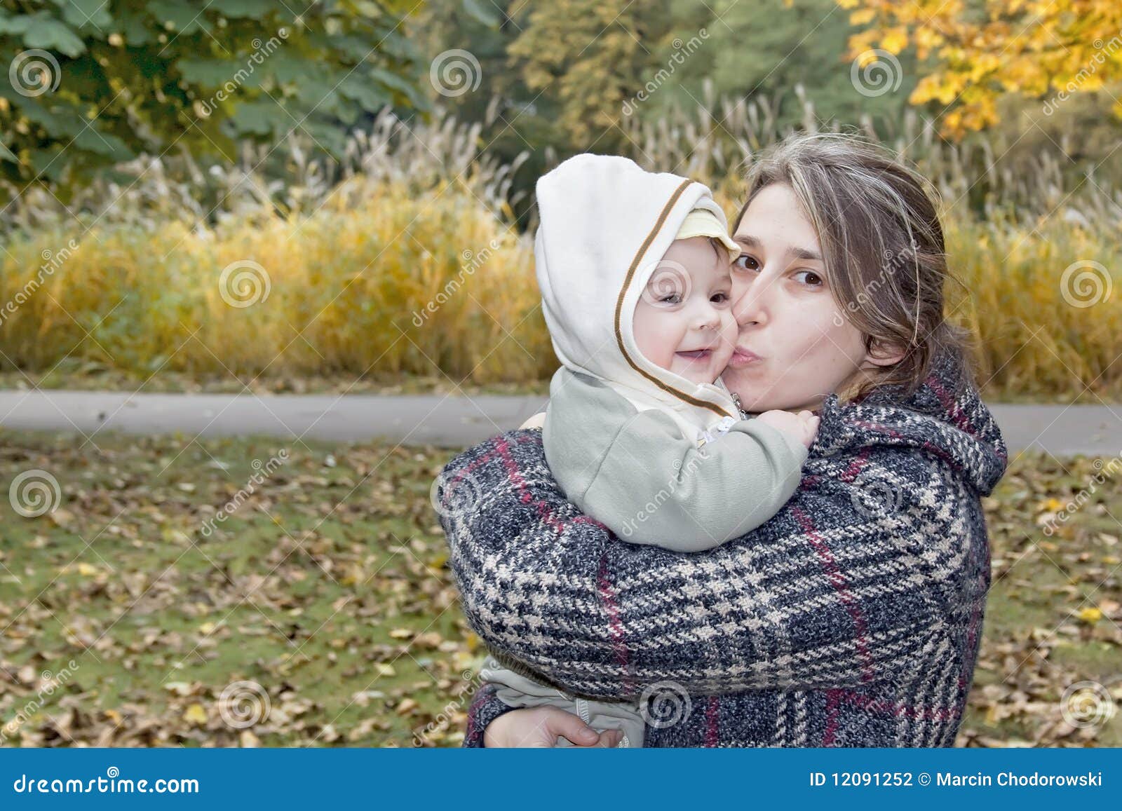 Tender kiss. stock photo. Image of colorful, golden, baby - 12091252