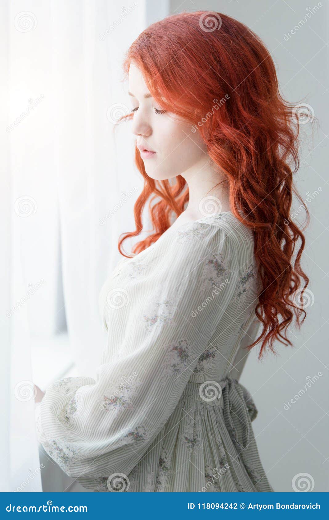 Tender Retro Portrait Of A Young Beautiful Dreamy Redhead Woman Stock