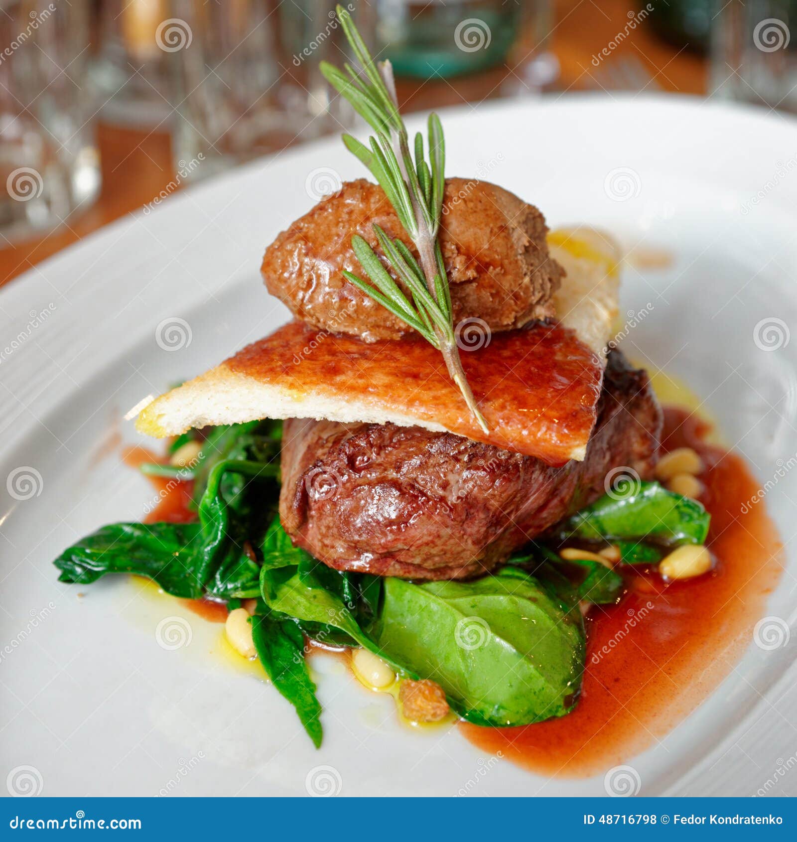Tenderloin Steak with Beef Terrine and Spinach Stock Photo - Image of ...