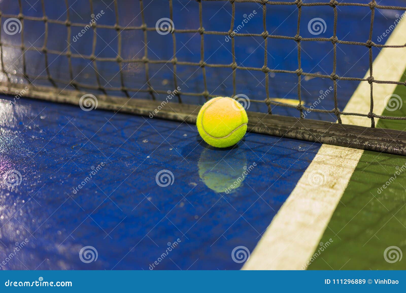 Tennis Ball and Net on Wet Ground after Raining Stock Image - Image of ...