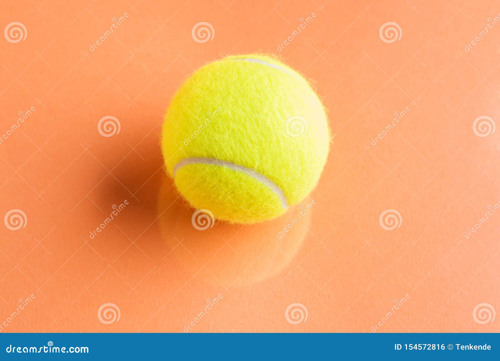 Tennis Ball on Orange Abstract Background Stock Photo - Image of ...